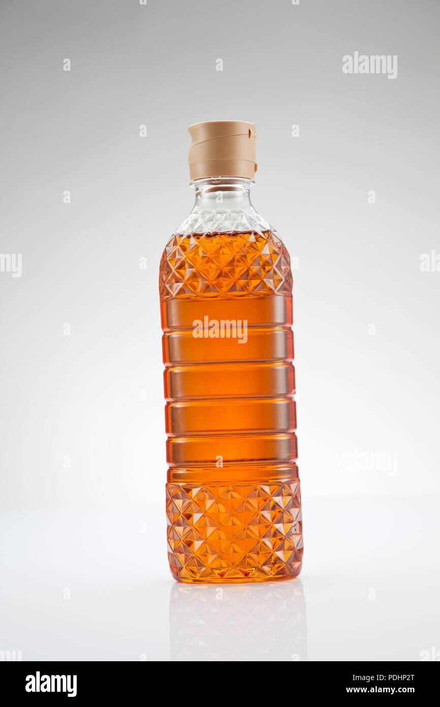 bottle of maple syrup on the white background Stock Photo - Alamy