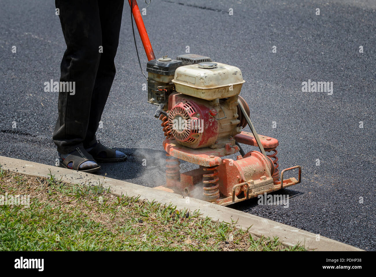 Compact compactor compacting hi-res stock photography and images - Alamy
