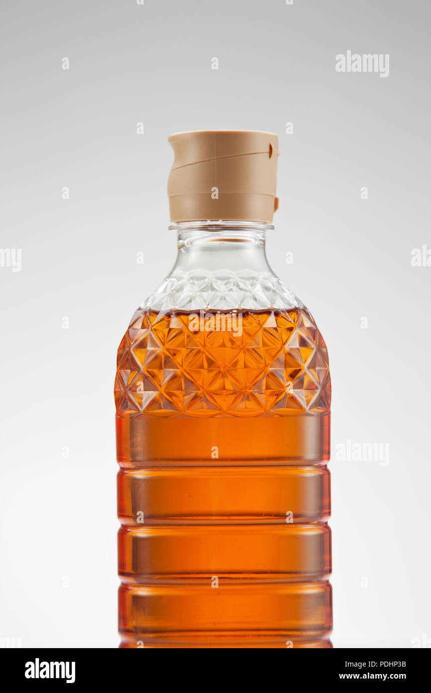 bottle of maple syrup on the white background Stock Photo - Alamy