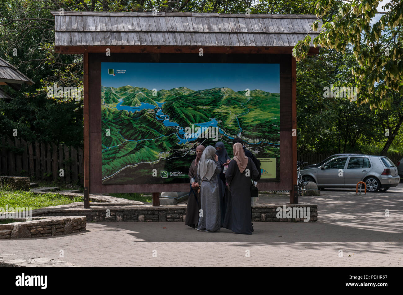 Croatia: muslim women at the entrance of Plitvice Lakes National Park ...