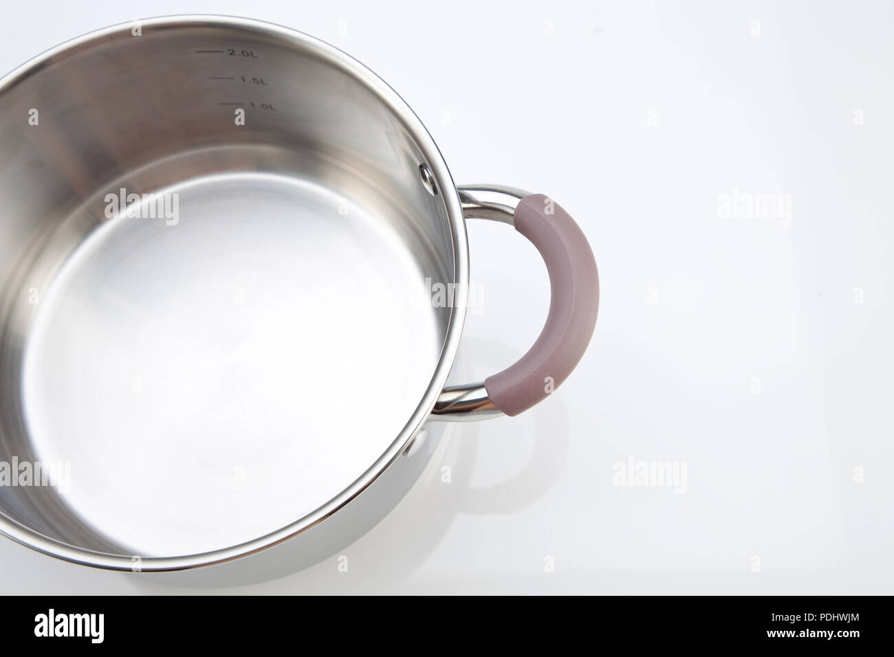 empty cooking pot on the white background Stock Photo - Alamy
