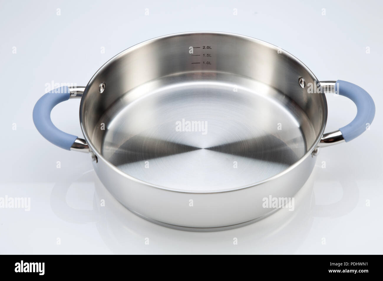 empty cooking pot on the white background Stock Photo - Alamy