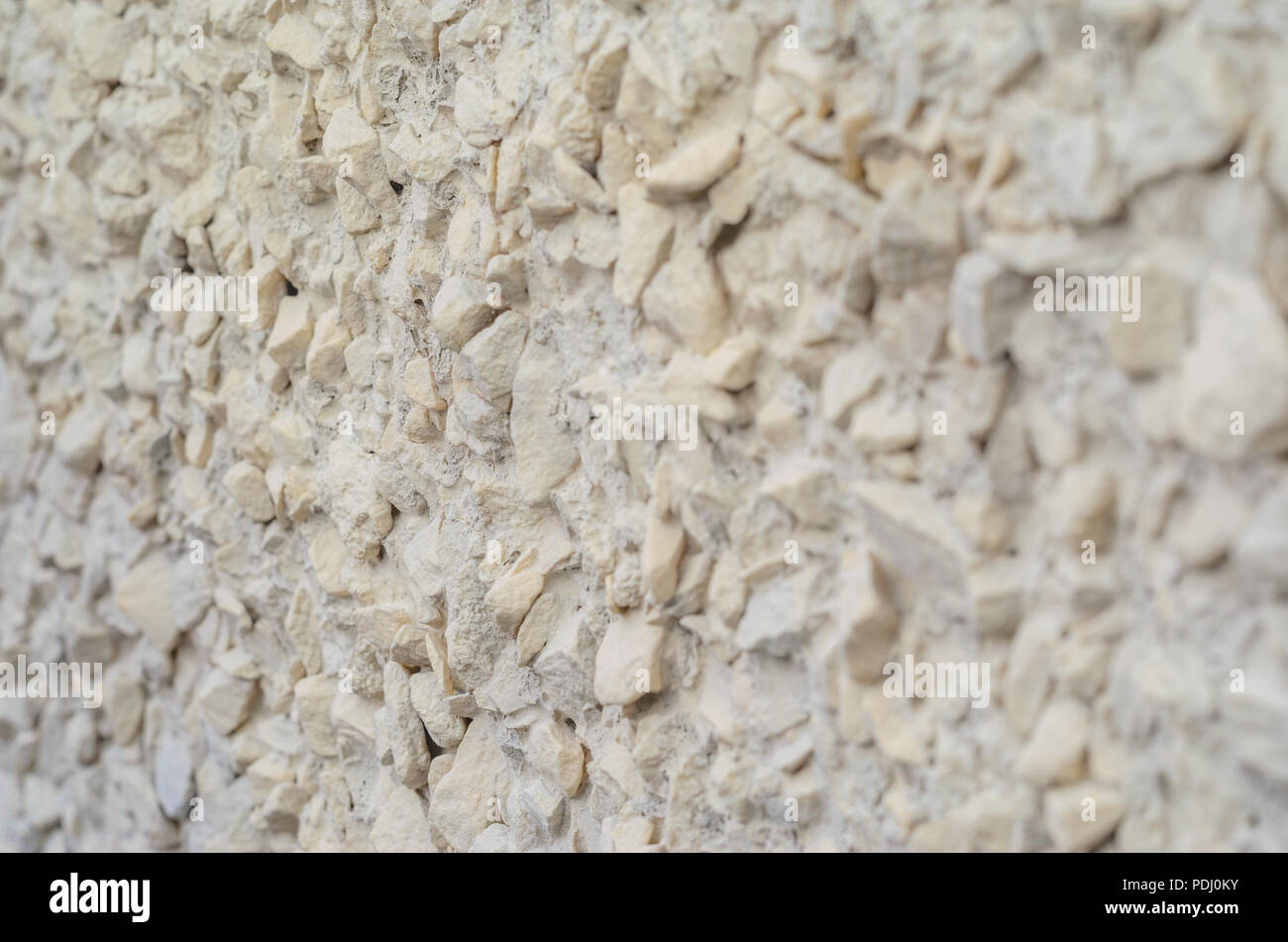 Pebble Plaster Wall Background Stock Photo - Alamy