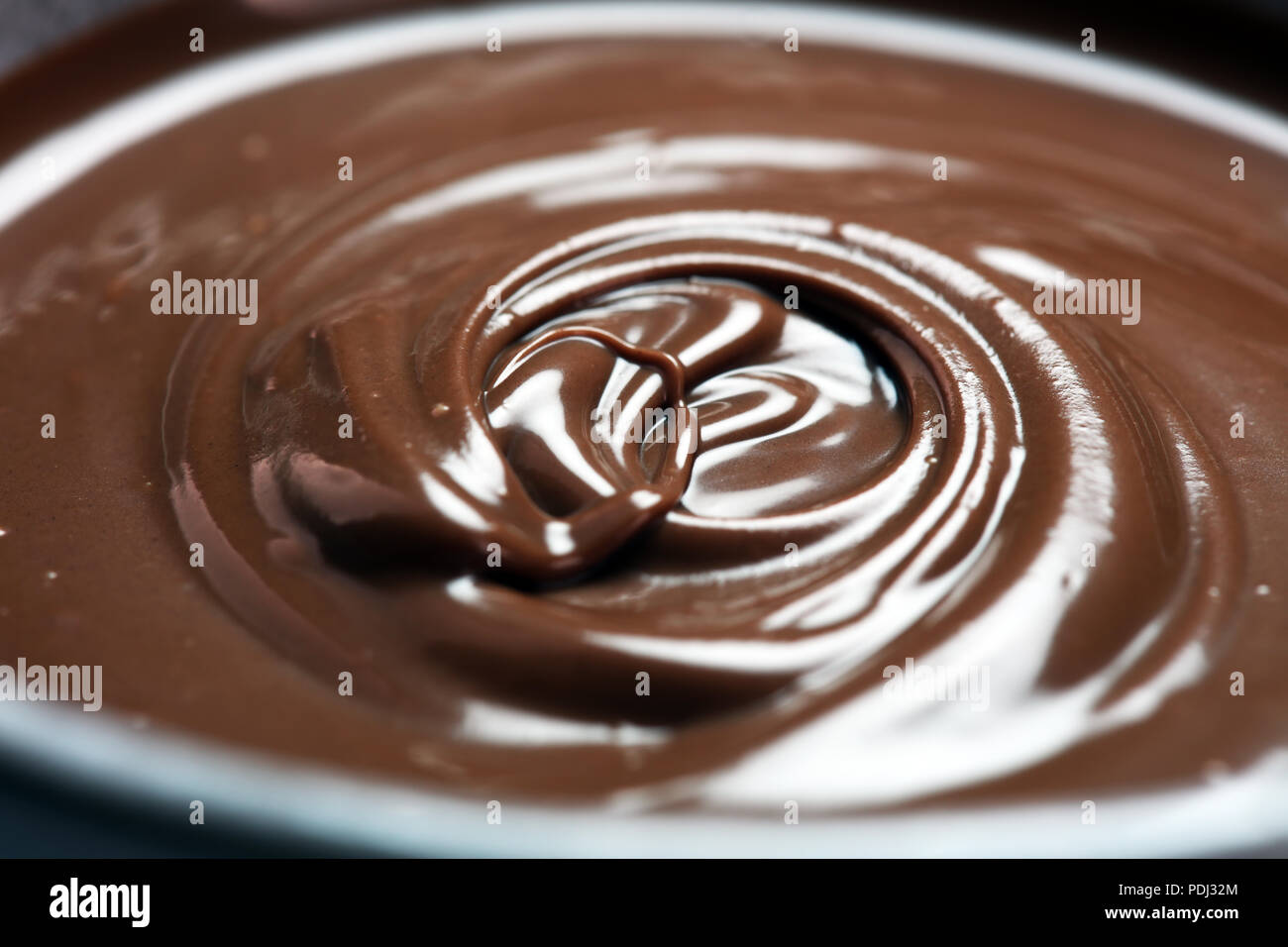 Melting chocolate, melted delicious chocolate for praline icing ...