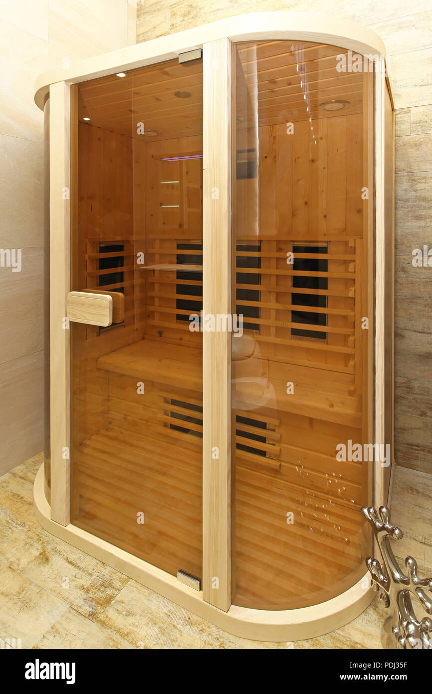 Modern Finnish style sauna cabin in bathroom Stock Photo - Alamy
