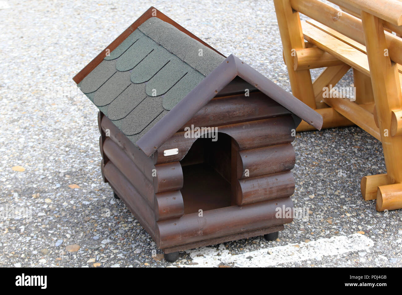 New dog house made from log wood Stock Photo - Alamy