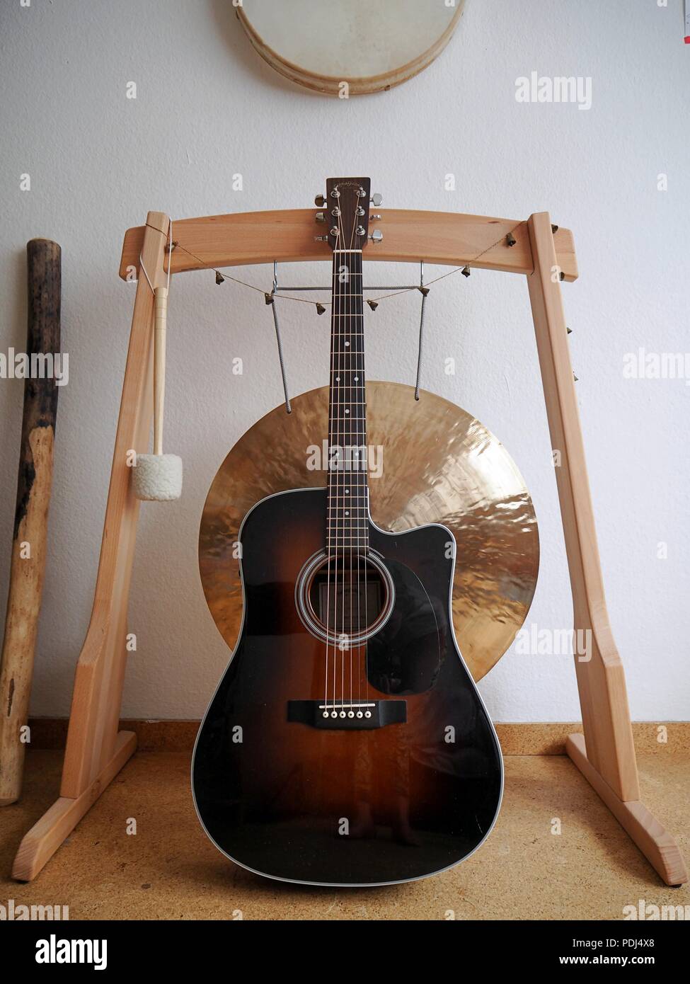 Sound healing instruments, Feng Gong, guitar and rainstick Stock Photo ...