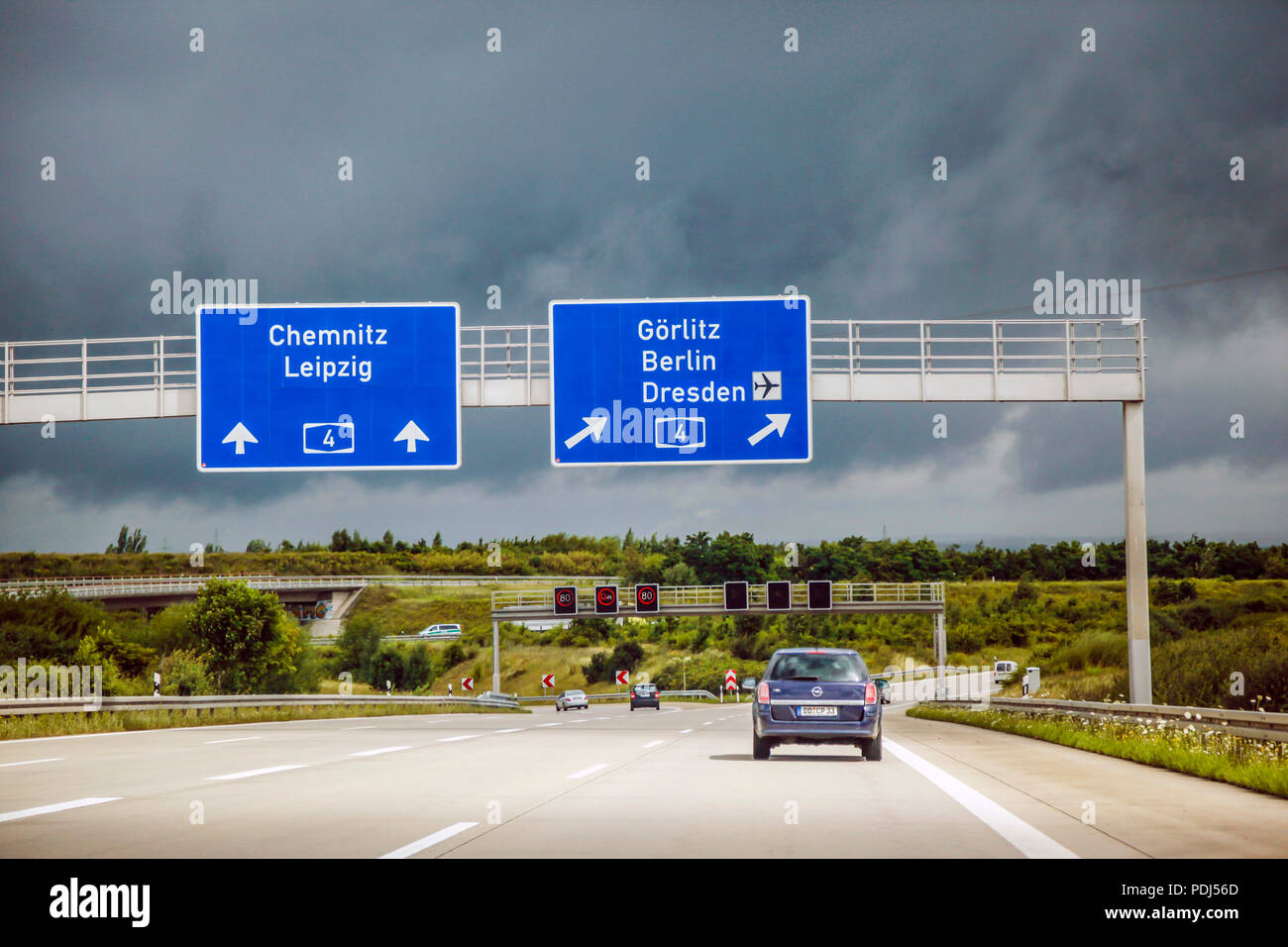 Blue overhead autobahn sign pointing to a intersection towards Leipzig ...