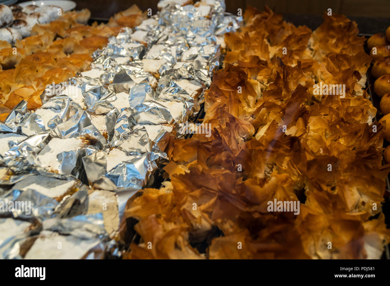 Typical portuguese pastry inside a bakery display Stock Photo - Alamy
