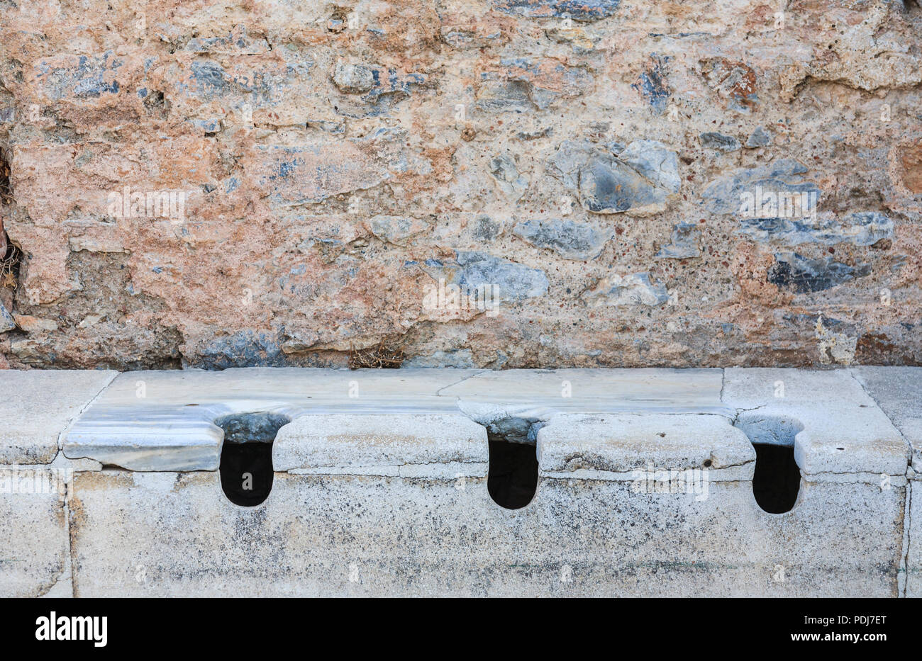 Stone communal toilets at Ephesus, an ancient Greek city settlement ...