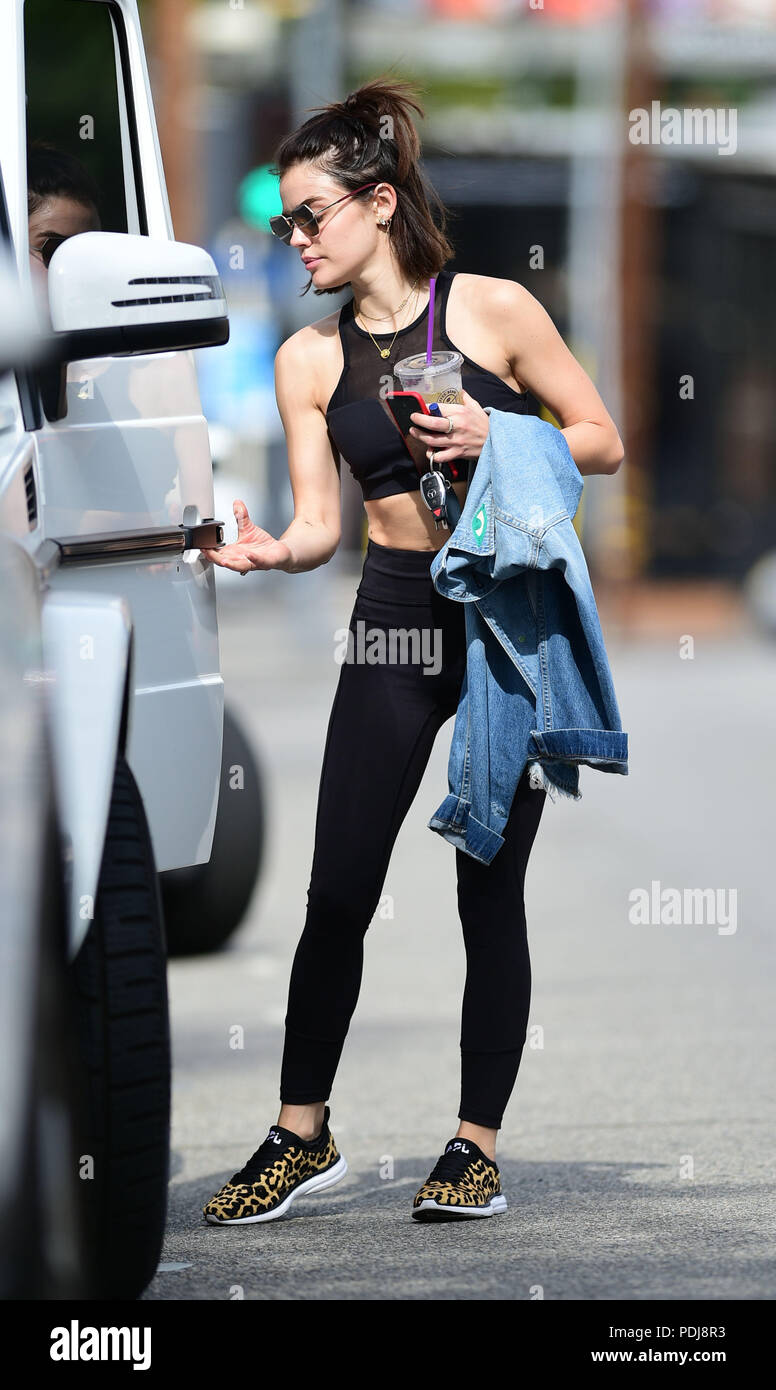 Lucy Hale sips a cold drink after her workout on a hot day in Los ...