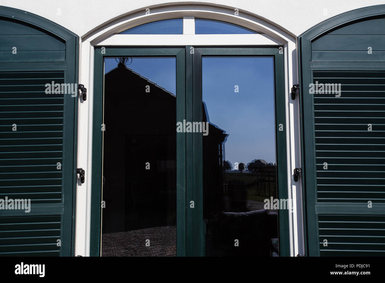 Wooden window with open shutters modern design Stock Photo - Alamy