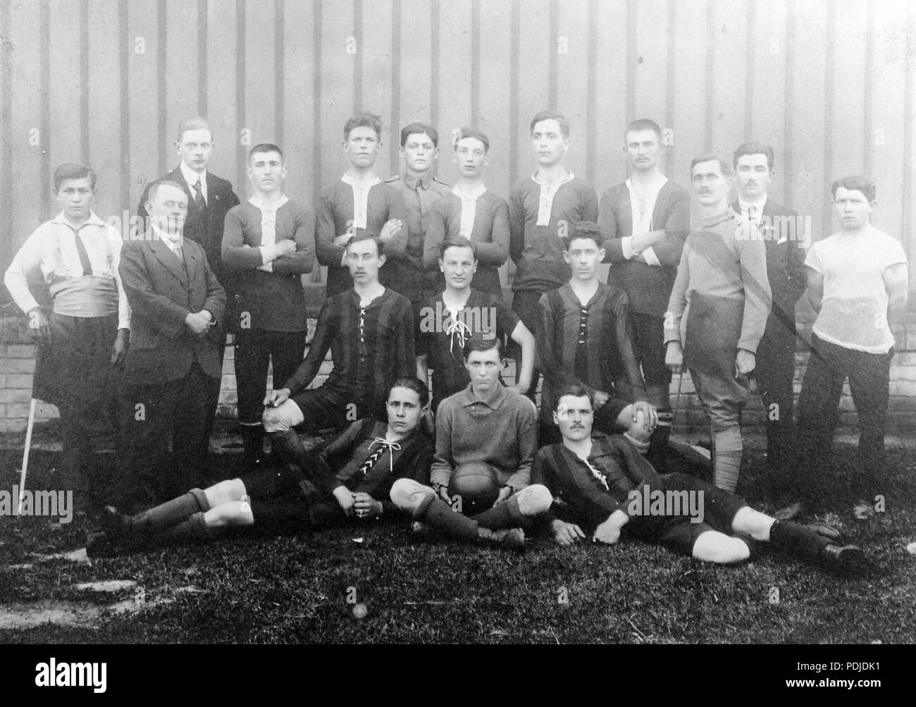 Collective portrait football athletes Black and White Stock Photos ...