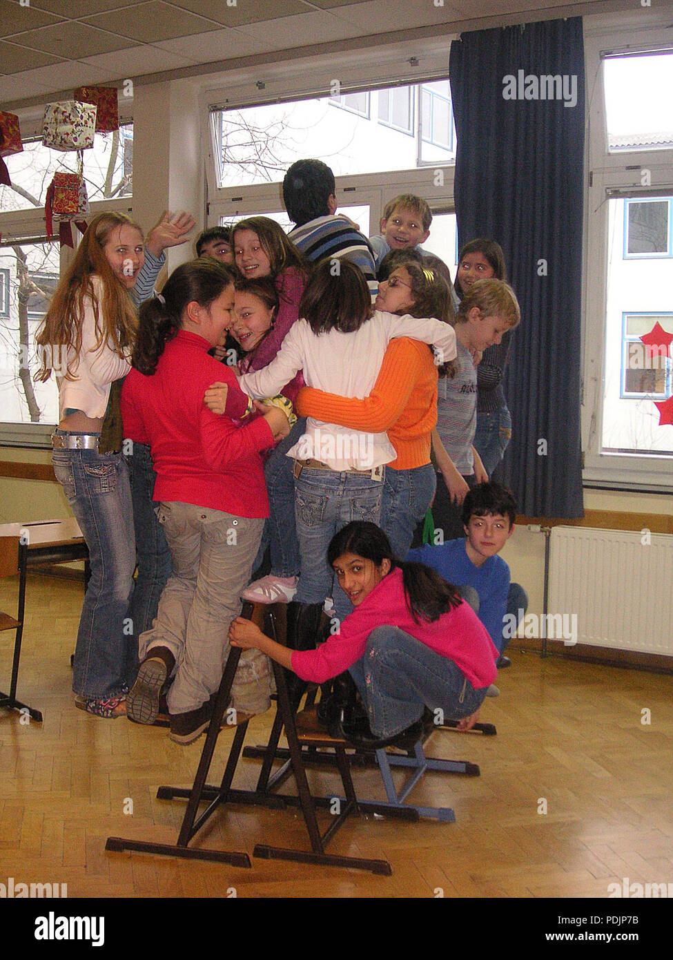 3 Non-competitive musical chairs Stock Photo - Alamy