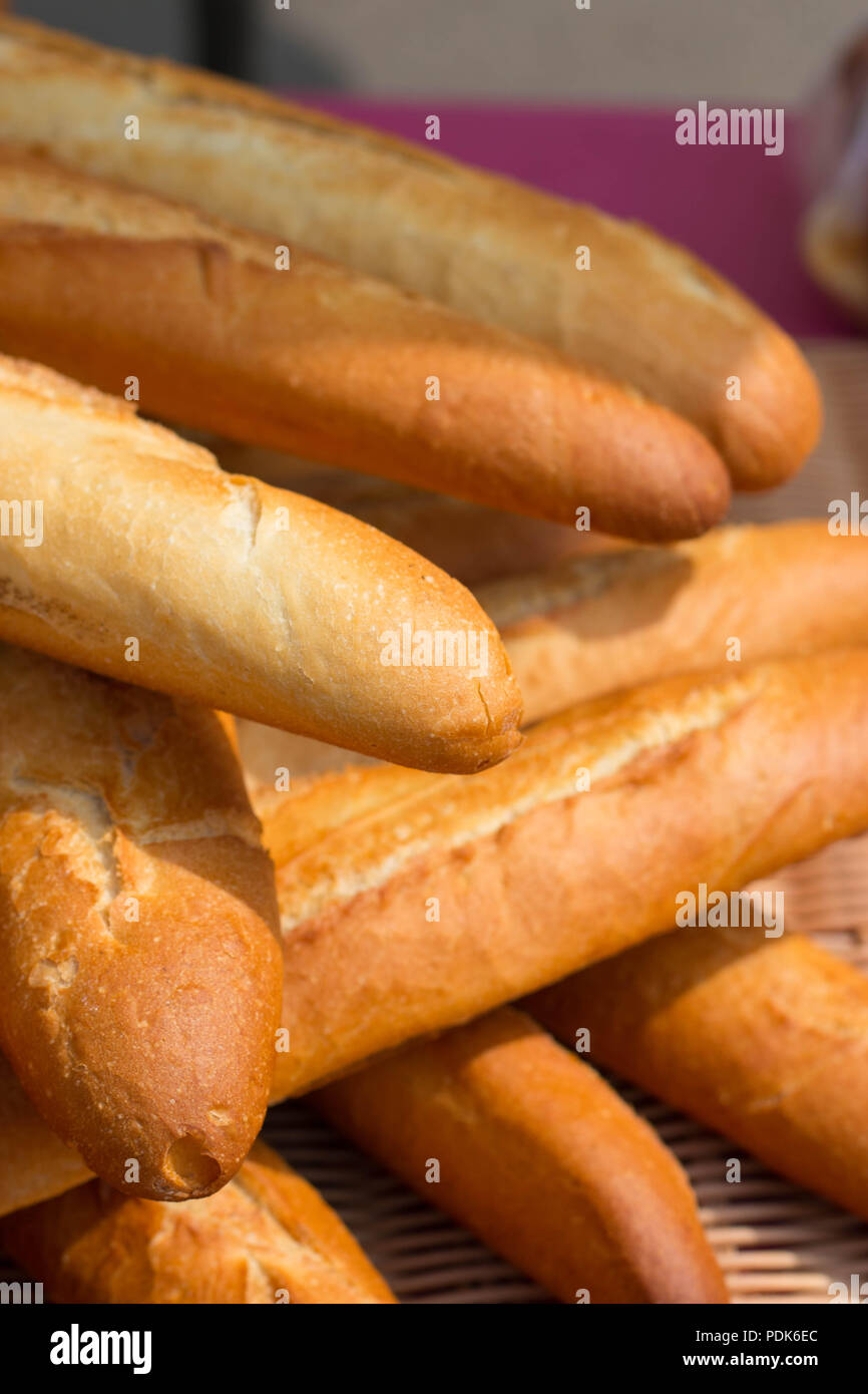 Baguettes, the famous long and thin french bread. Close up of some ...