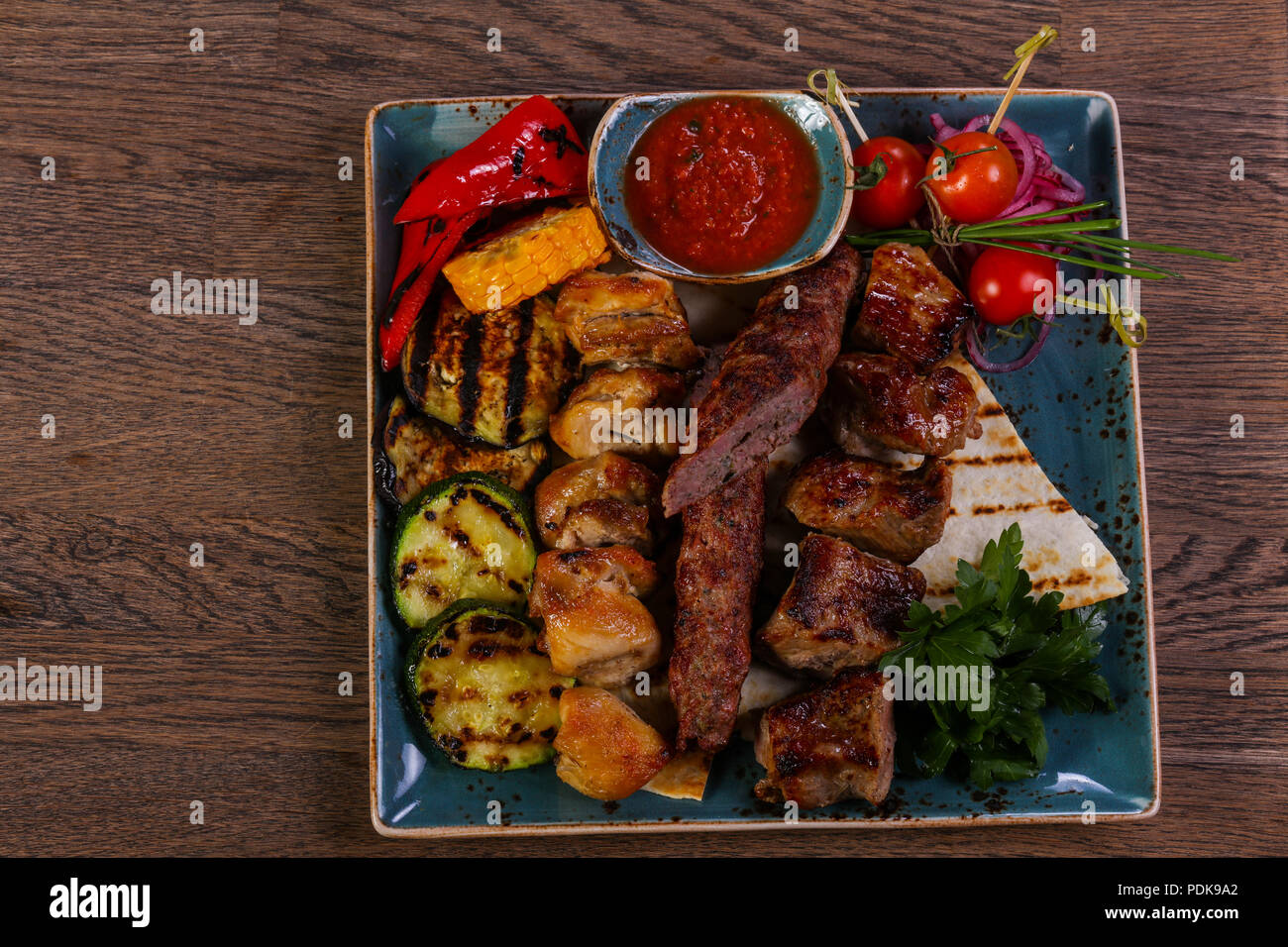 Grilled plate mix assortment meat Stock Photo - Alamy