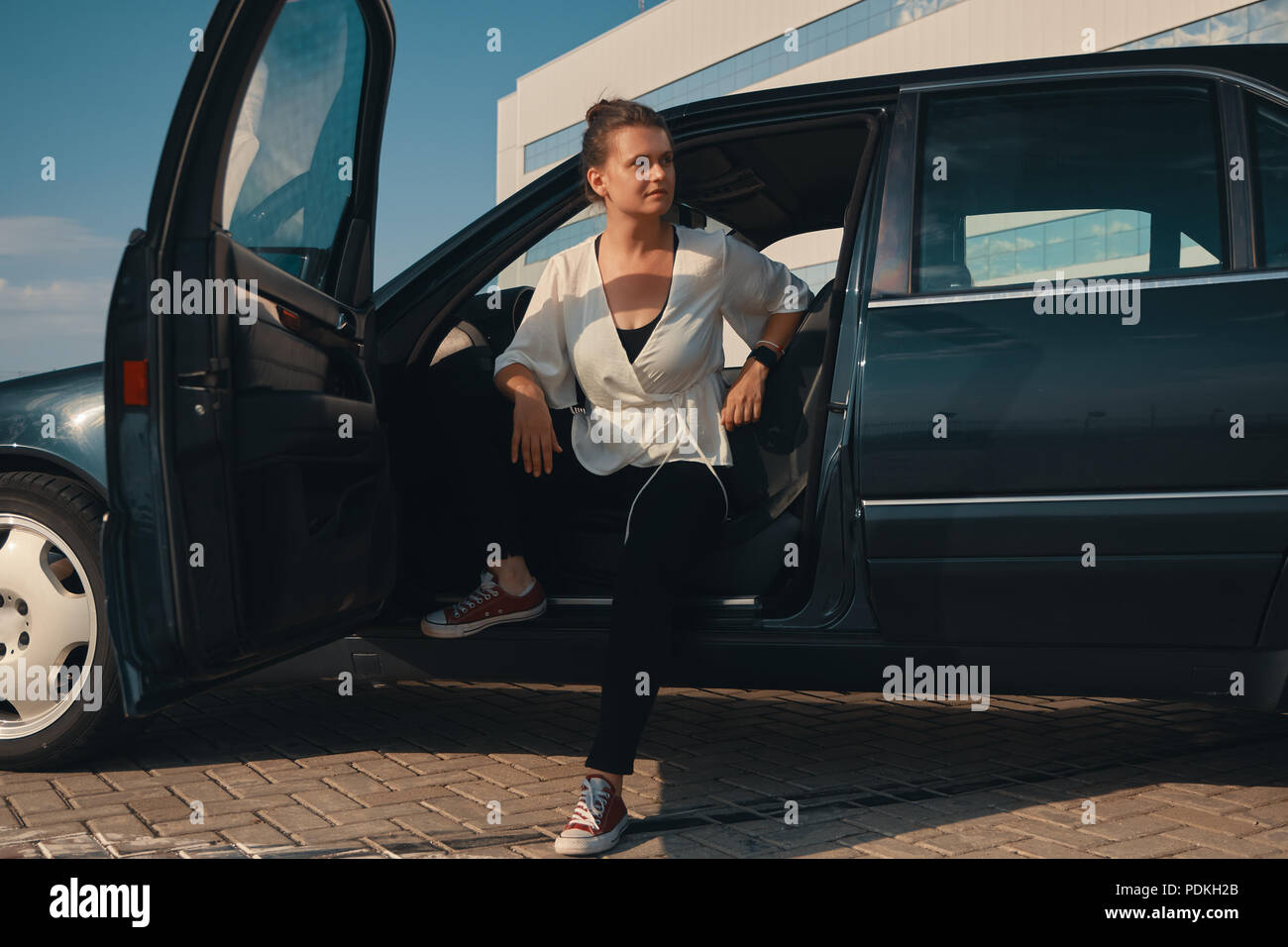 Cropped view woman driving hi-res stock photography and images - Alamy