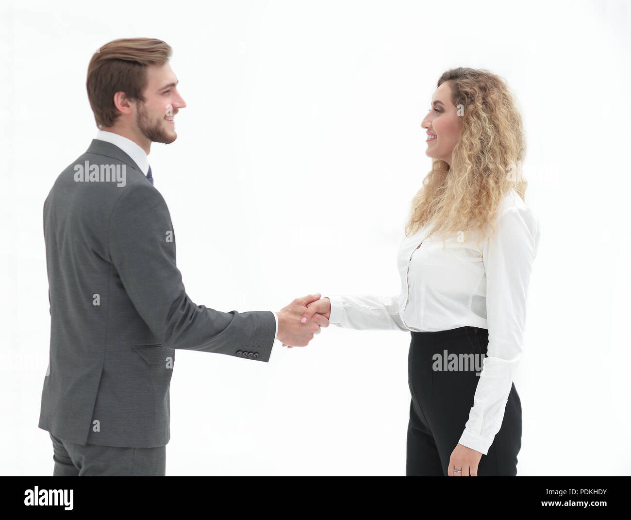 handshake Manager and client on blurred background Stock Photo - Alamy