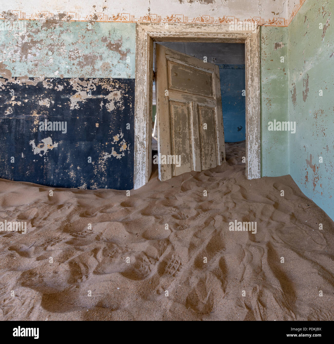 Sand has invaded and taken over these rooms in Kolmanskoppe, Namibia ...