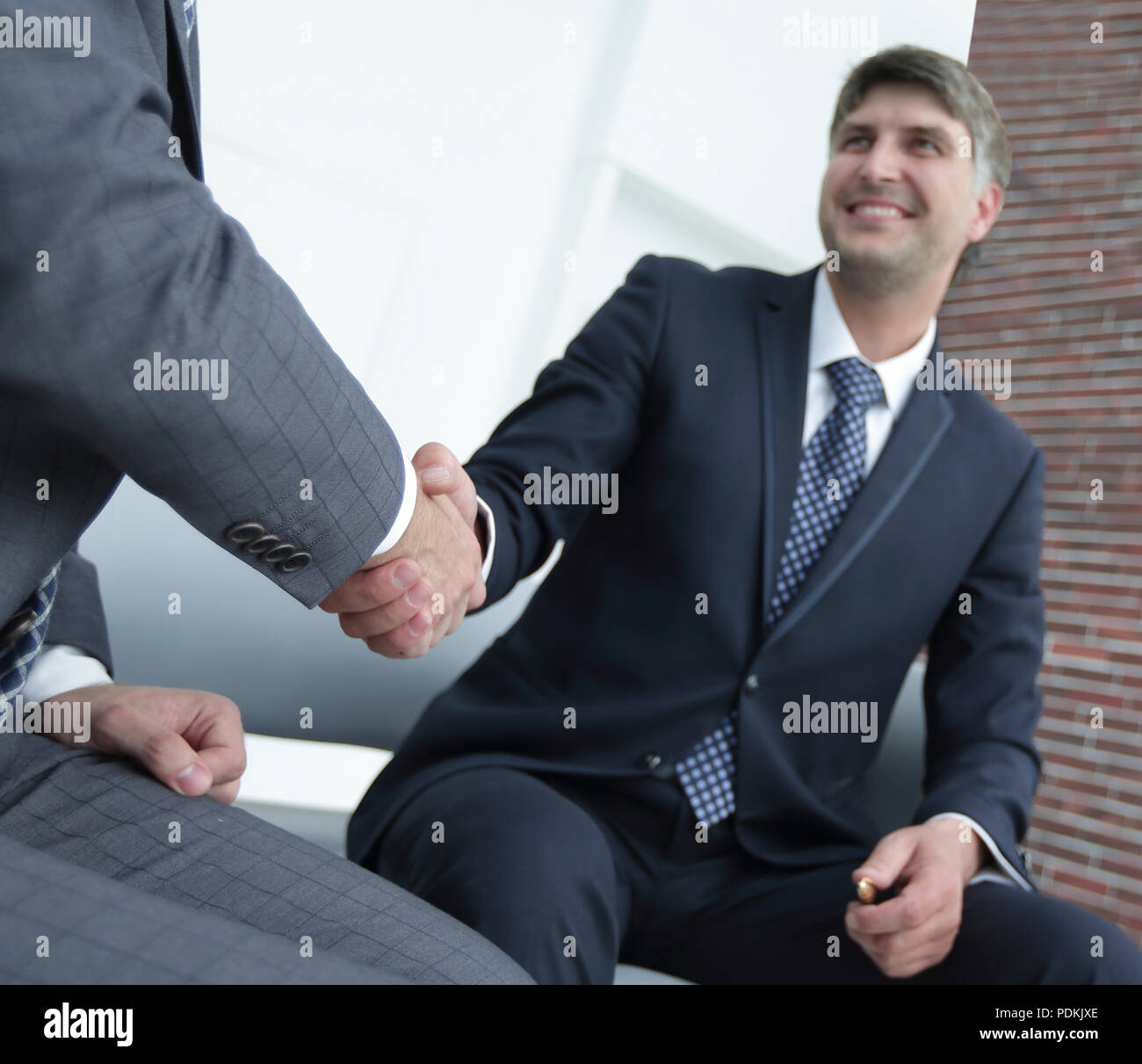 Handshake manager and attorney in the office Stock Photo - Alamy