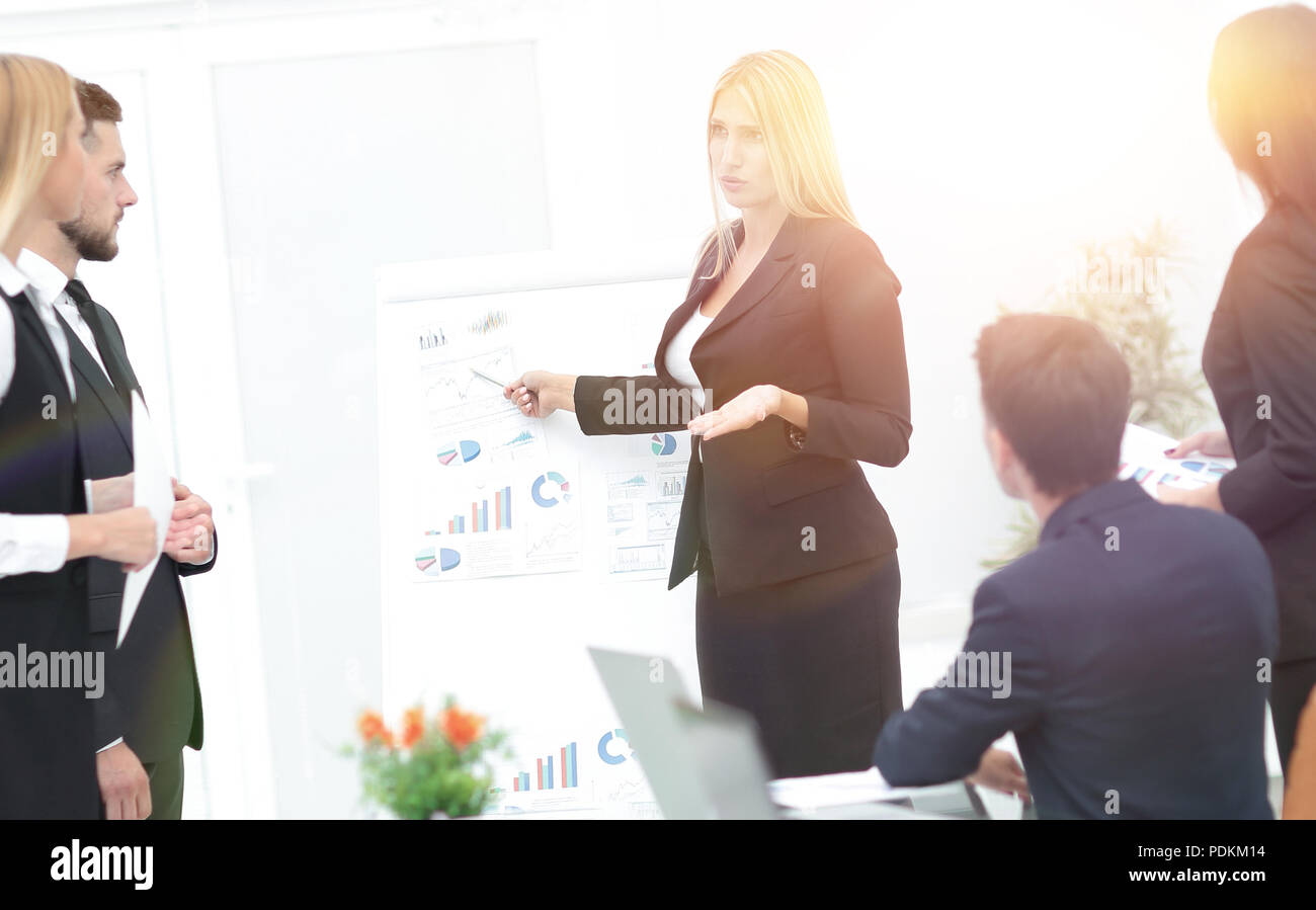 business woman doing a presentation to his business team Stock Photo ...
