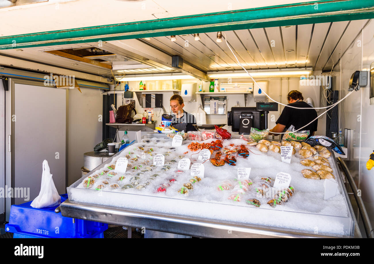 Stall selling fresh seafood on display in Littlehampton, a small ...