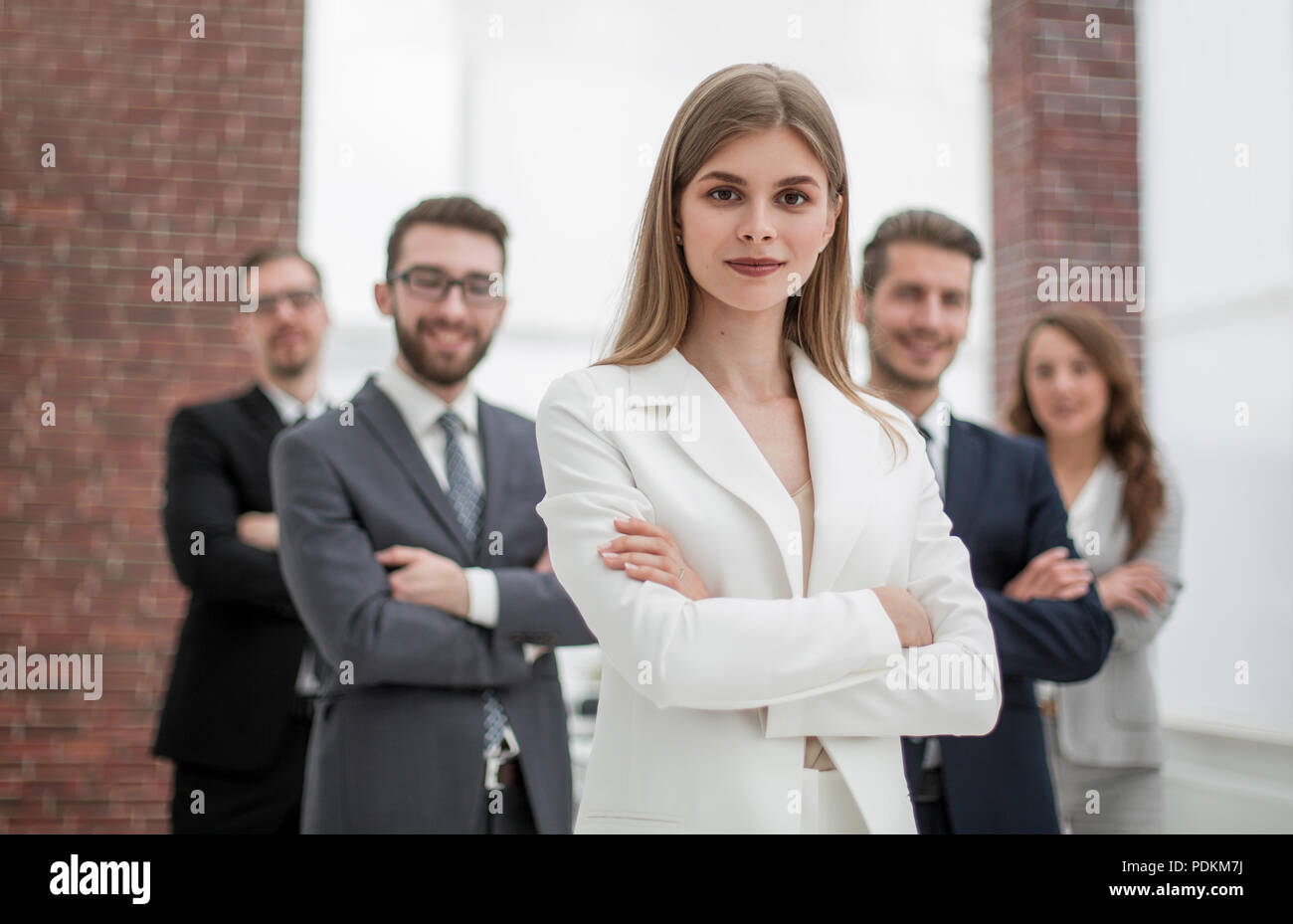successful business team standing in the office Stock Photo - Alamy