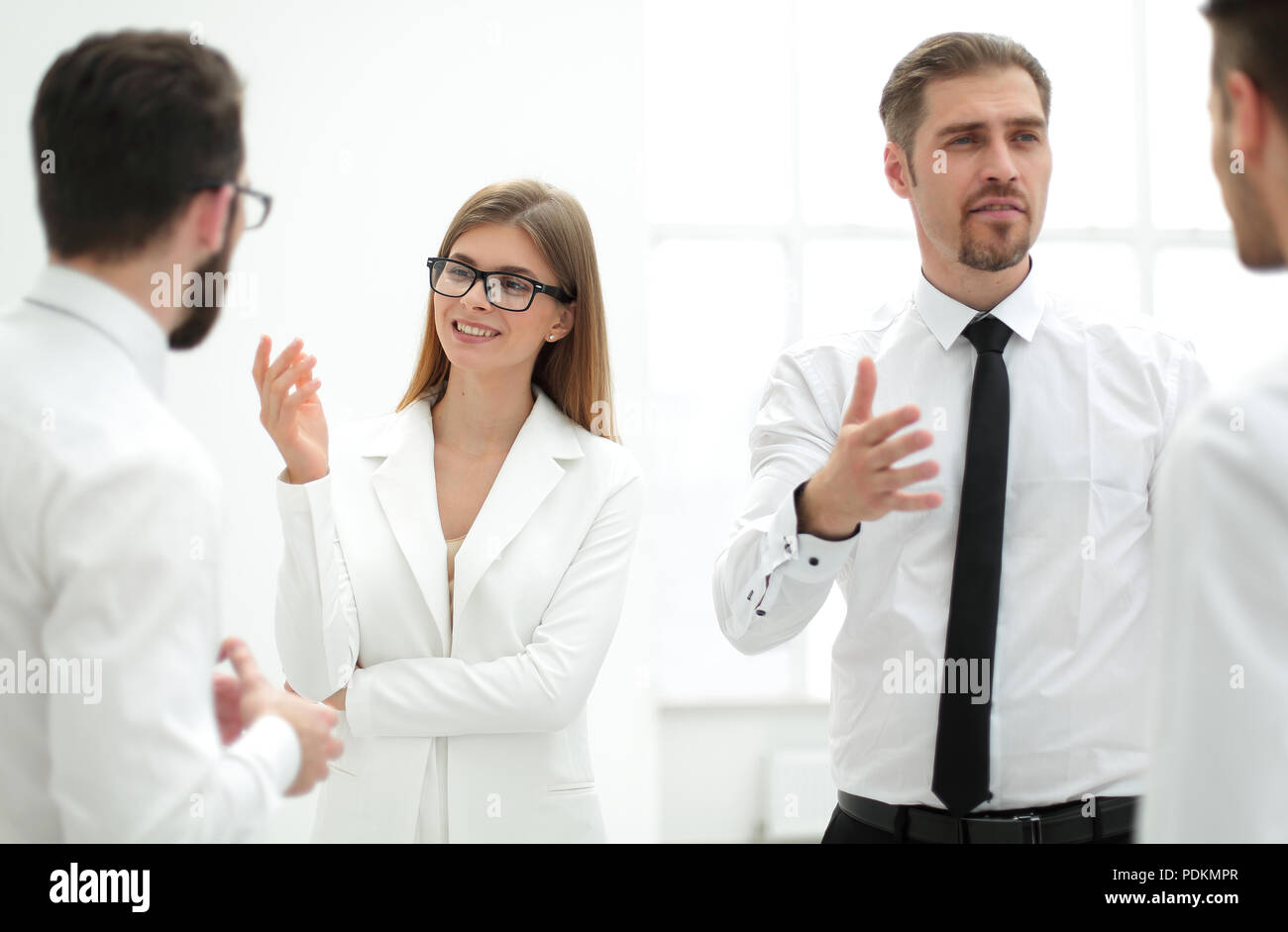 company employees discussing current tasks Stock Photo - Alamy