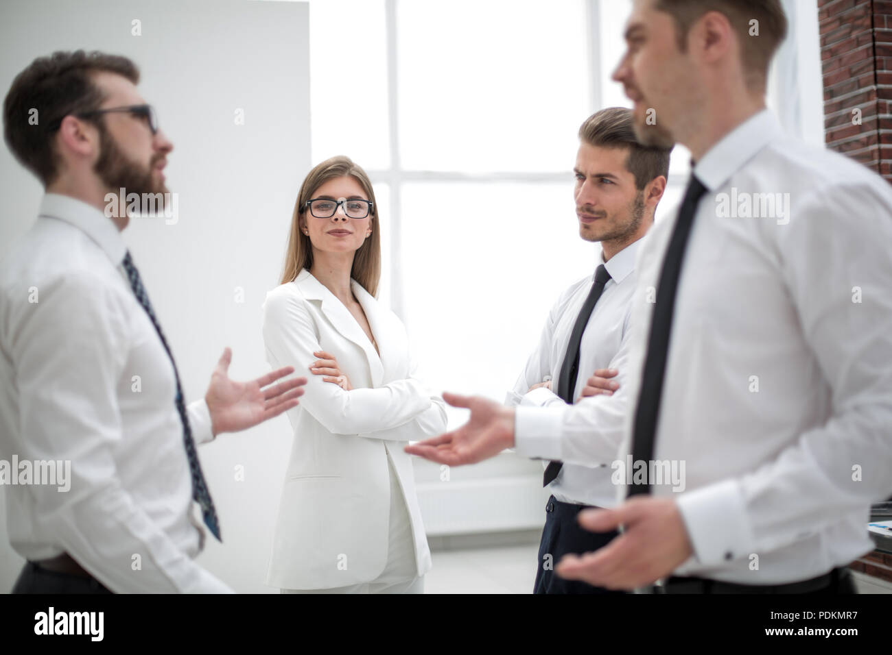 Female boss speaking group employees hi-res stock photography and ...