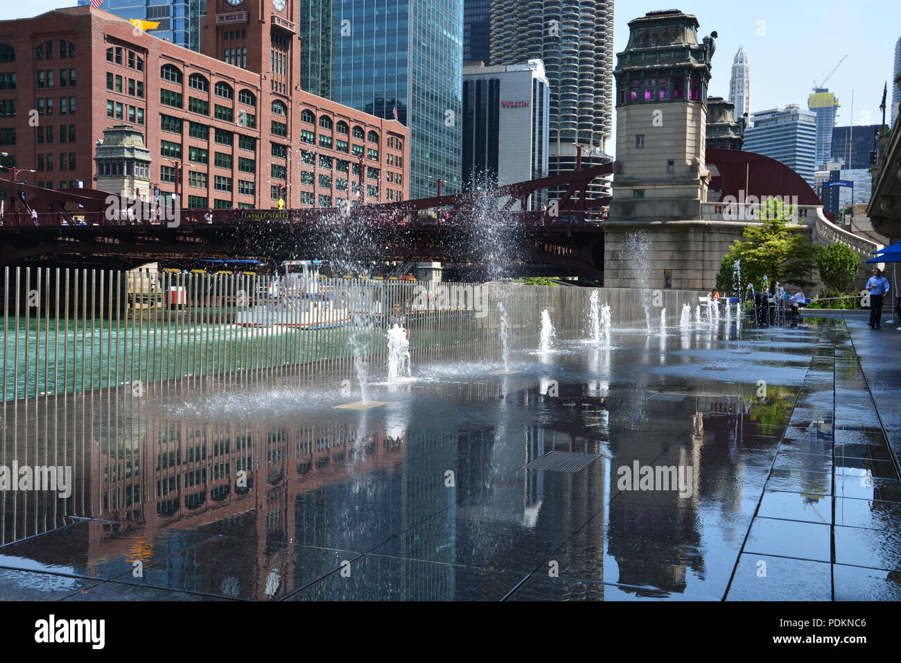 The zero depth splash fountains along Chicago's Riverwalk provide the ...