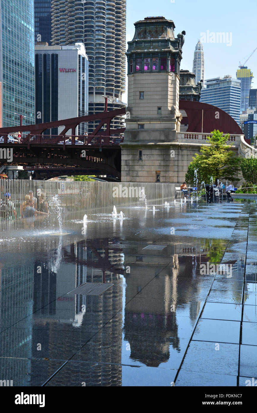 The zero depth splash fountains along Chicago's Riverwalk provide the ...