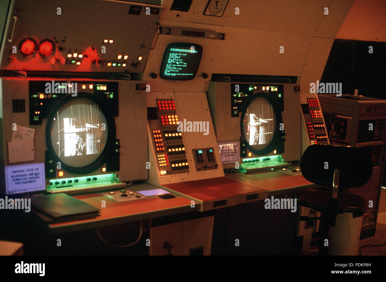 A close-up view of two AN/APN-22 precision approach radar screens in ...