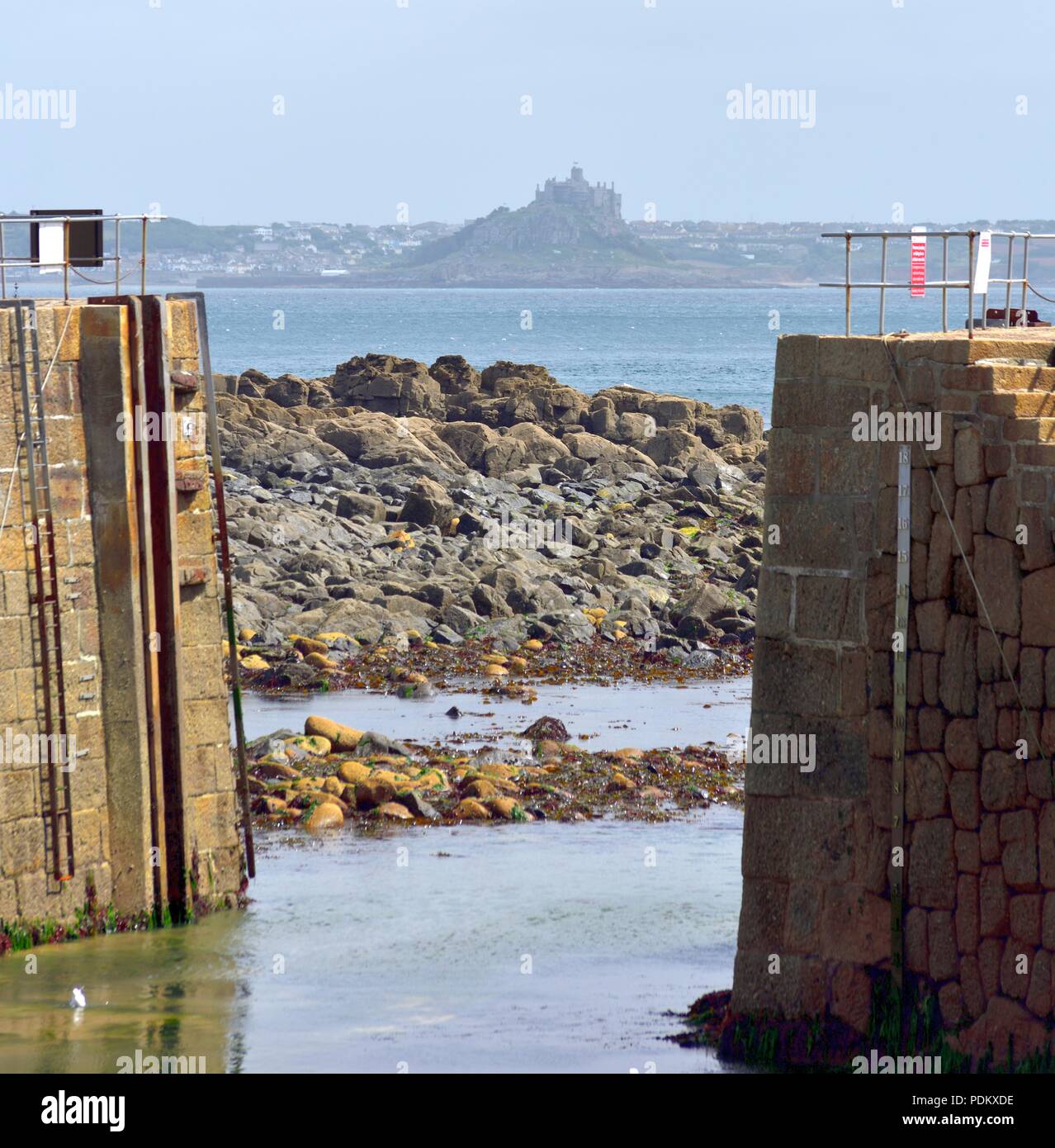 Harbour entrance to the fishing village of Mousehole,Cornwall,England ...