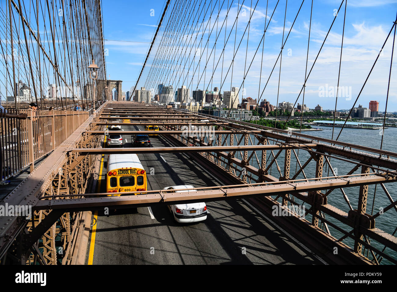 New York City, USA - June 20, 2018: Cars speeding on Brooklyn Bridge ...