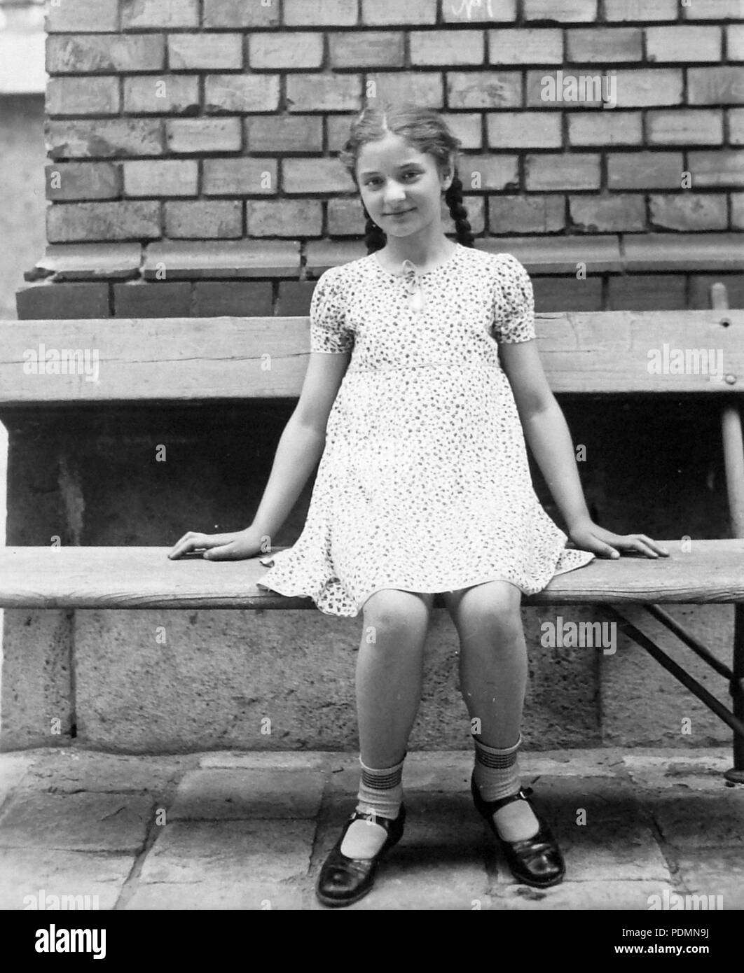 142 Girl, street furniture, portrait Fortepan 8294 Stock Photo - Alamy