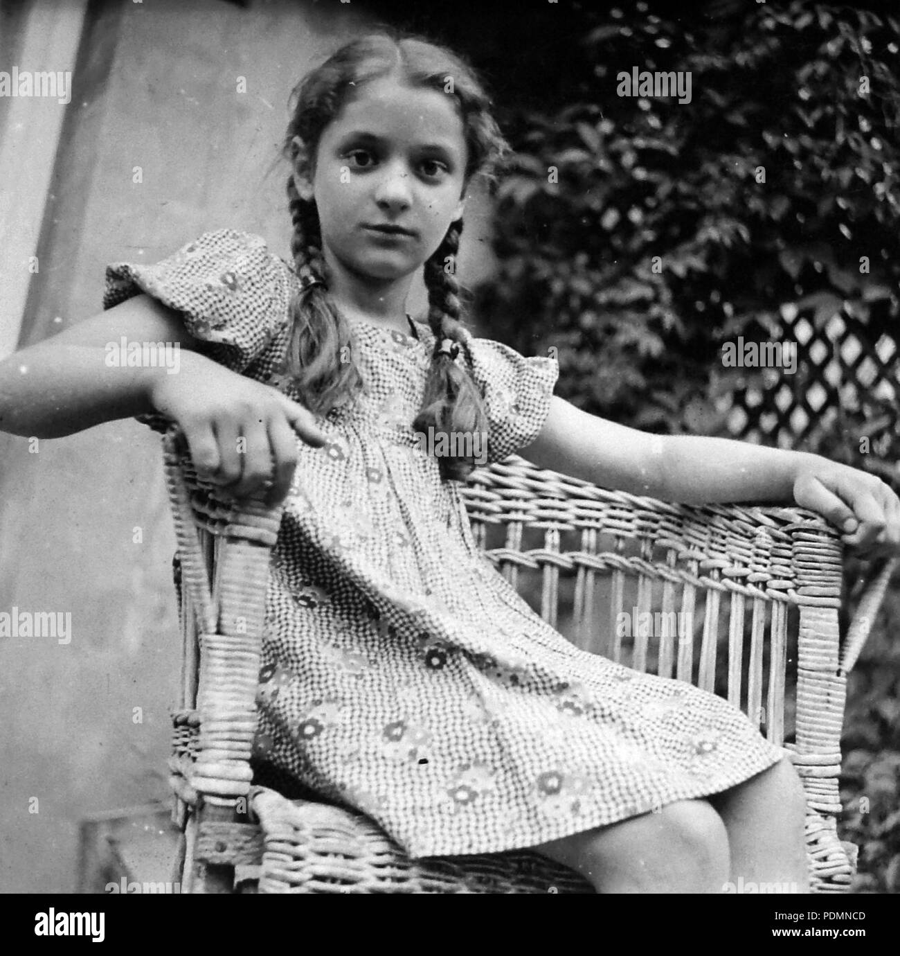 7 Portrait, kid, wicker chair Fortepan 8297 Stock Photo - Alamy