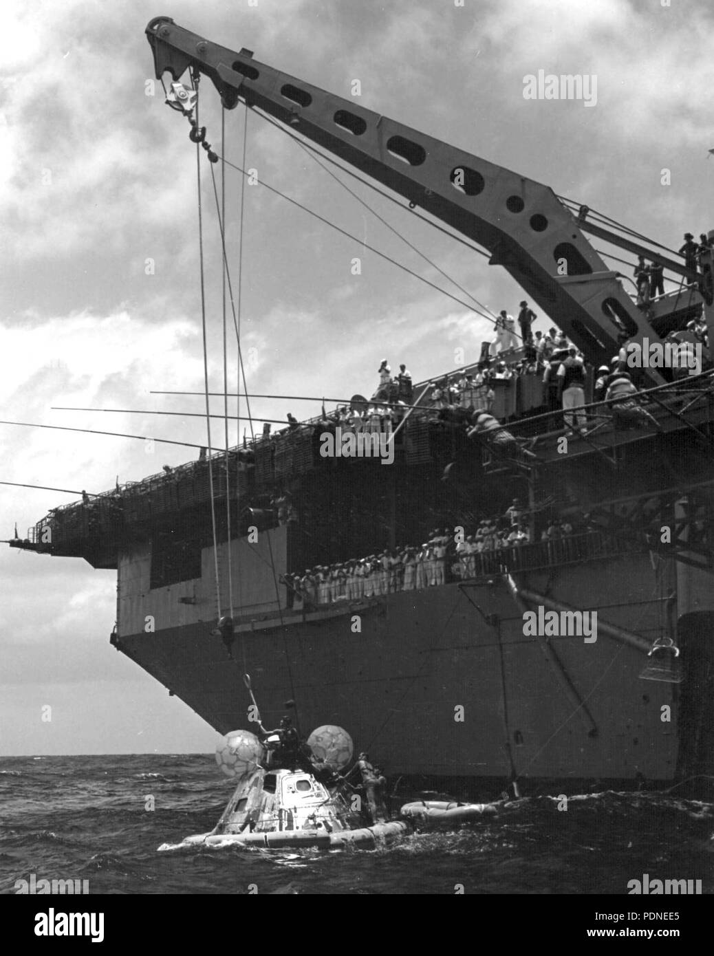 Apollo 11 space capsule alongside USS Hornet (CVS-12) 1969 Stock Photo ...