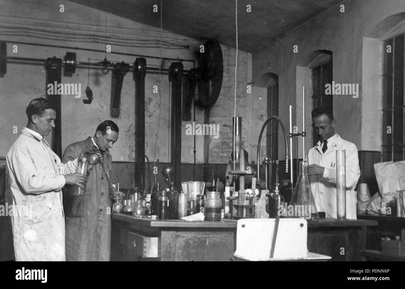 Lab overalls Black and White Stock Photos & Images - Alamy