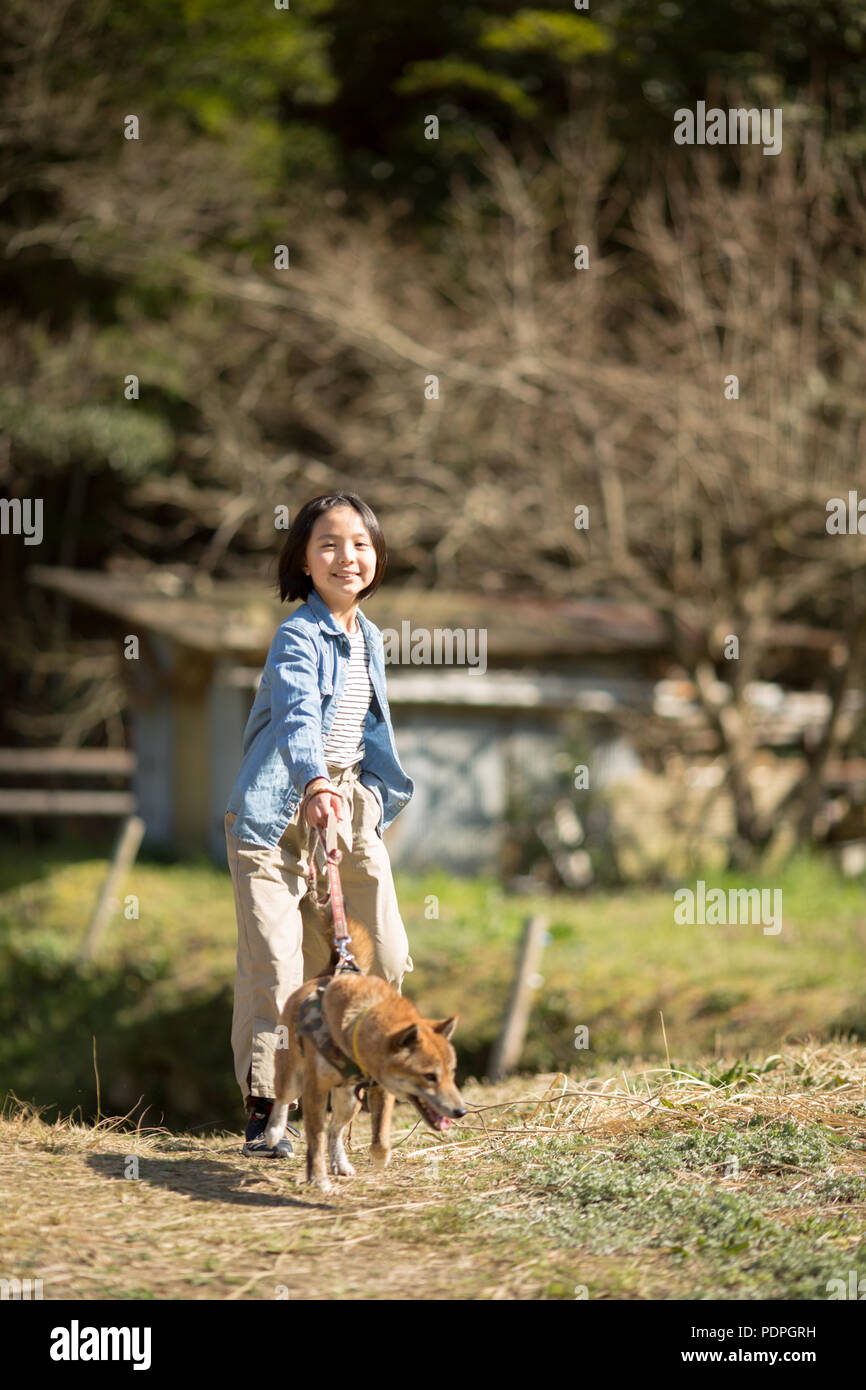 Girl with Shiba Inu Stock Photo - Alamy