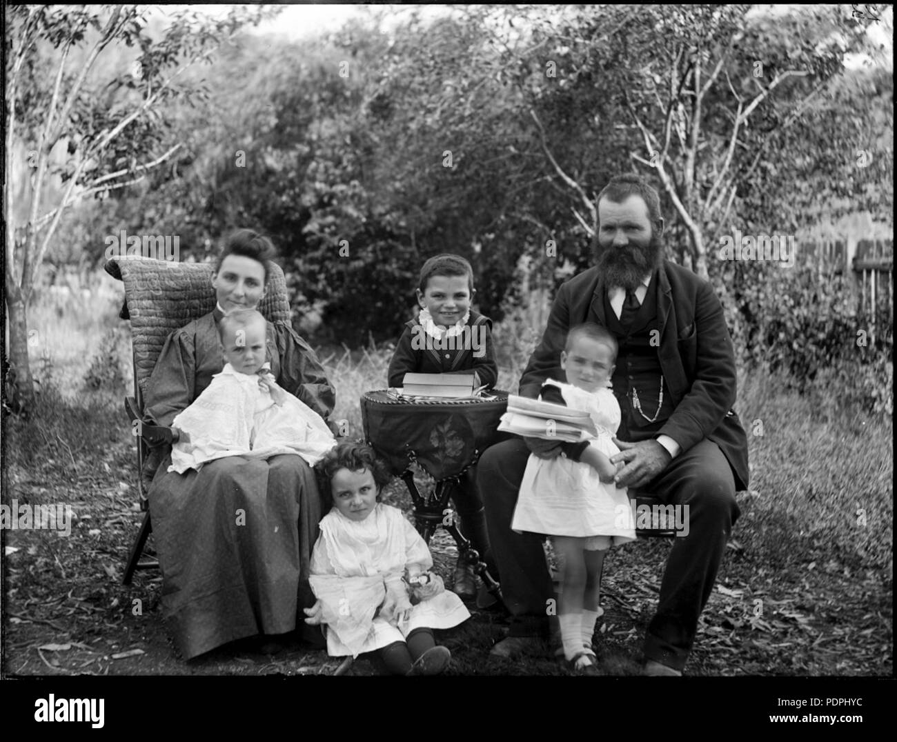 45 Family portrait in overgrown garden (3506214921 Stock Photo - Alamy