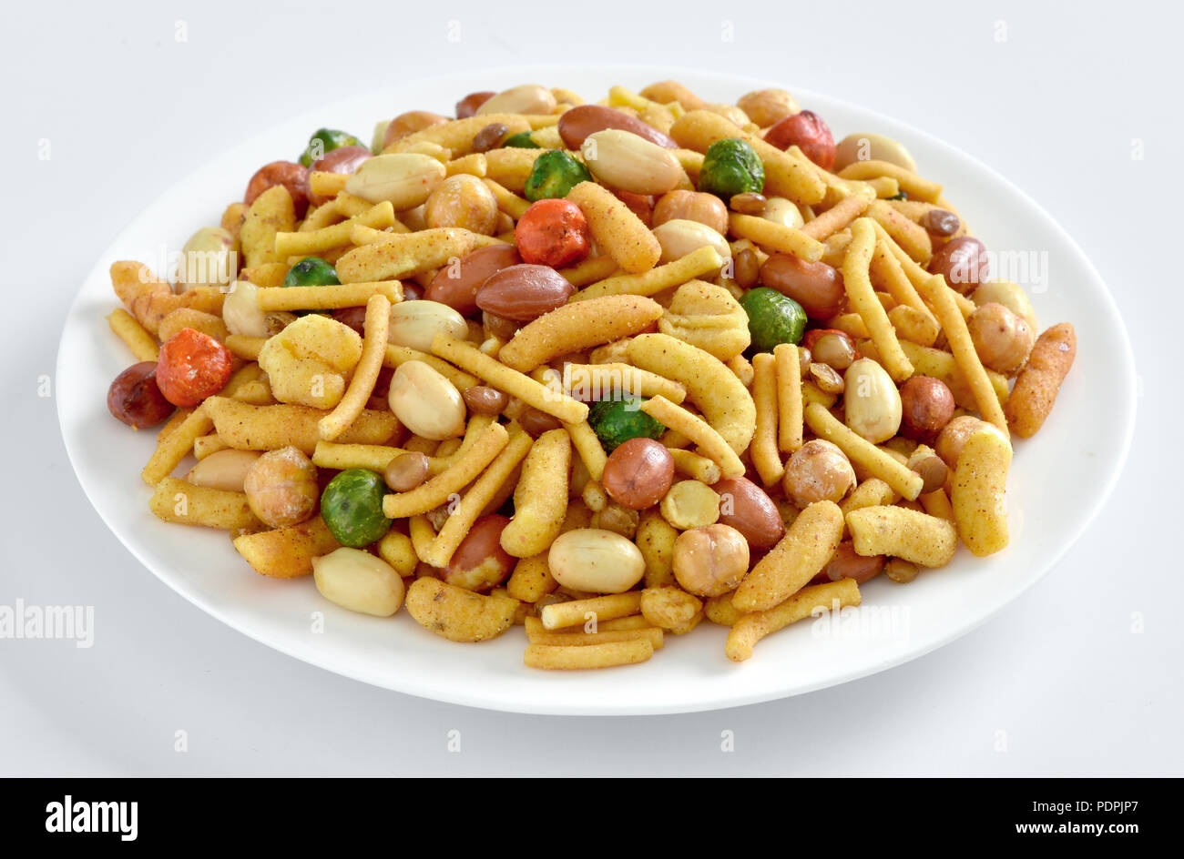 Mix Nimco, delicious blend of nuts, sev and crackers Stock Photo - Alamy