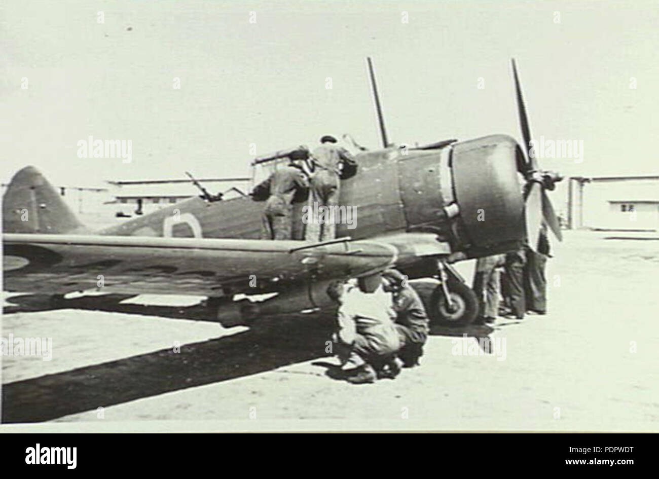 14 Arming 4 Squadron RAAF Wirraway WWII AWM 044476 Stock Photo - Alamy