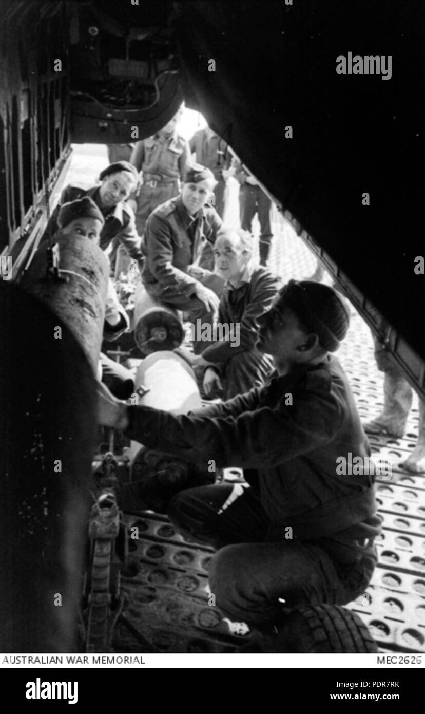 80 Loading depth charges into 458 Squadron RAAF Wellington Algeria WWII ...