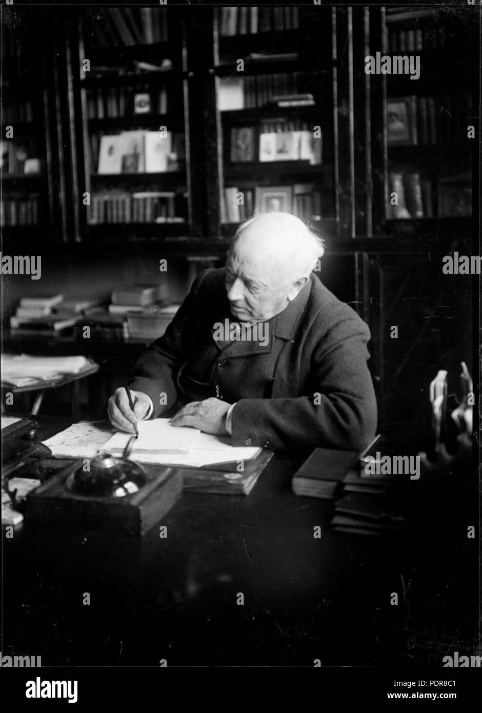 Man working in an office man working in an office Black and White Stock ...