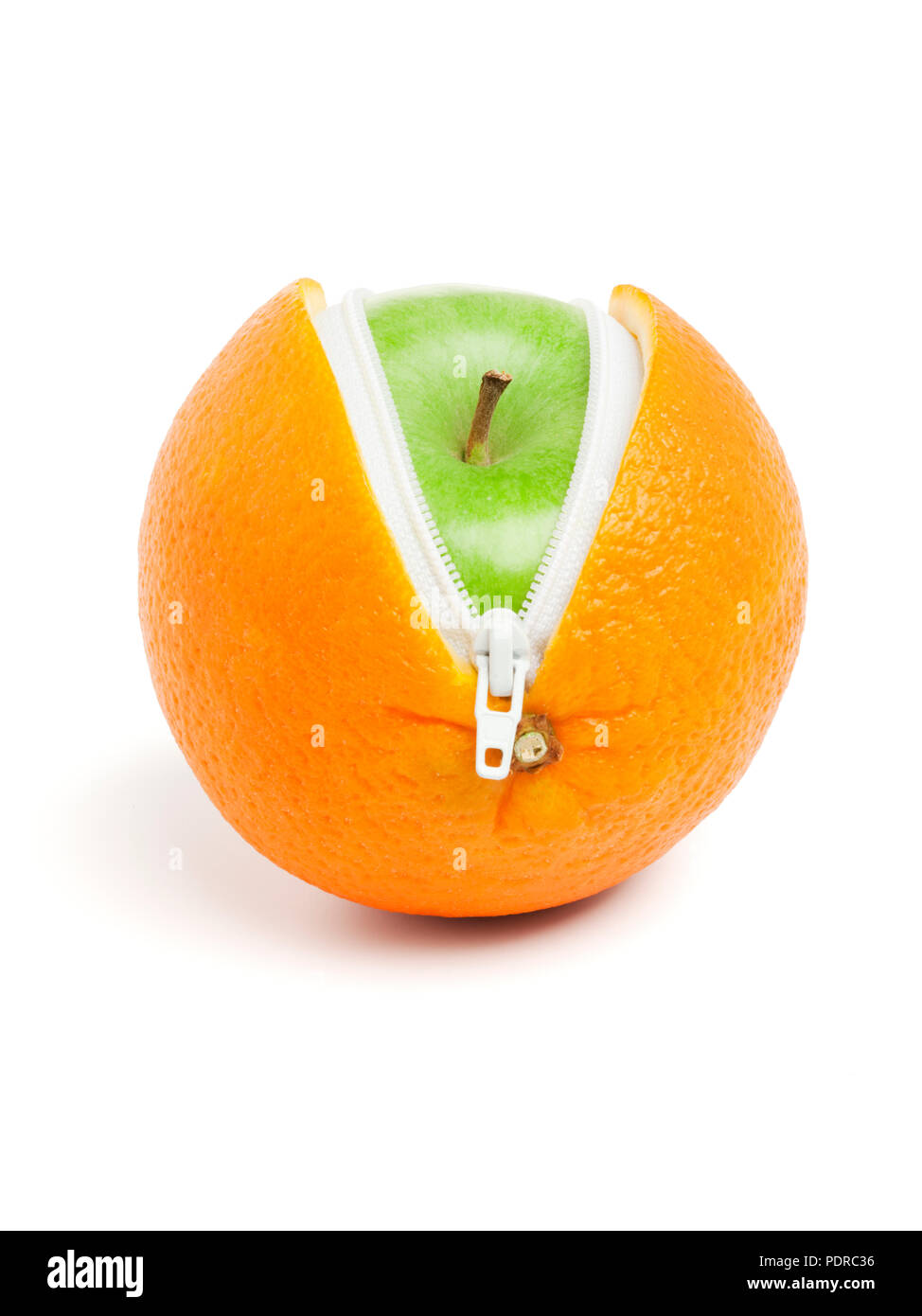 green apple inside orange peel with zipper, isolated on white Stock ...
