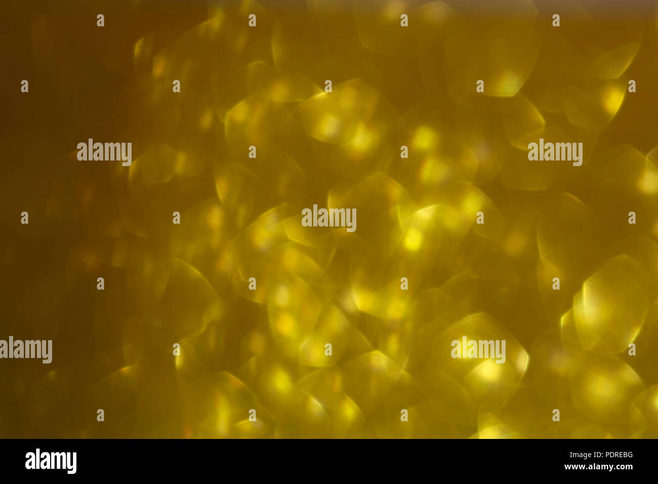 Shiny gold abstract background with a bokeh effect Stock Photo - Alamy
