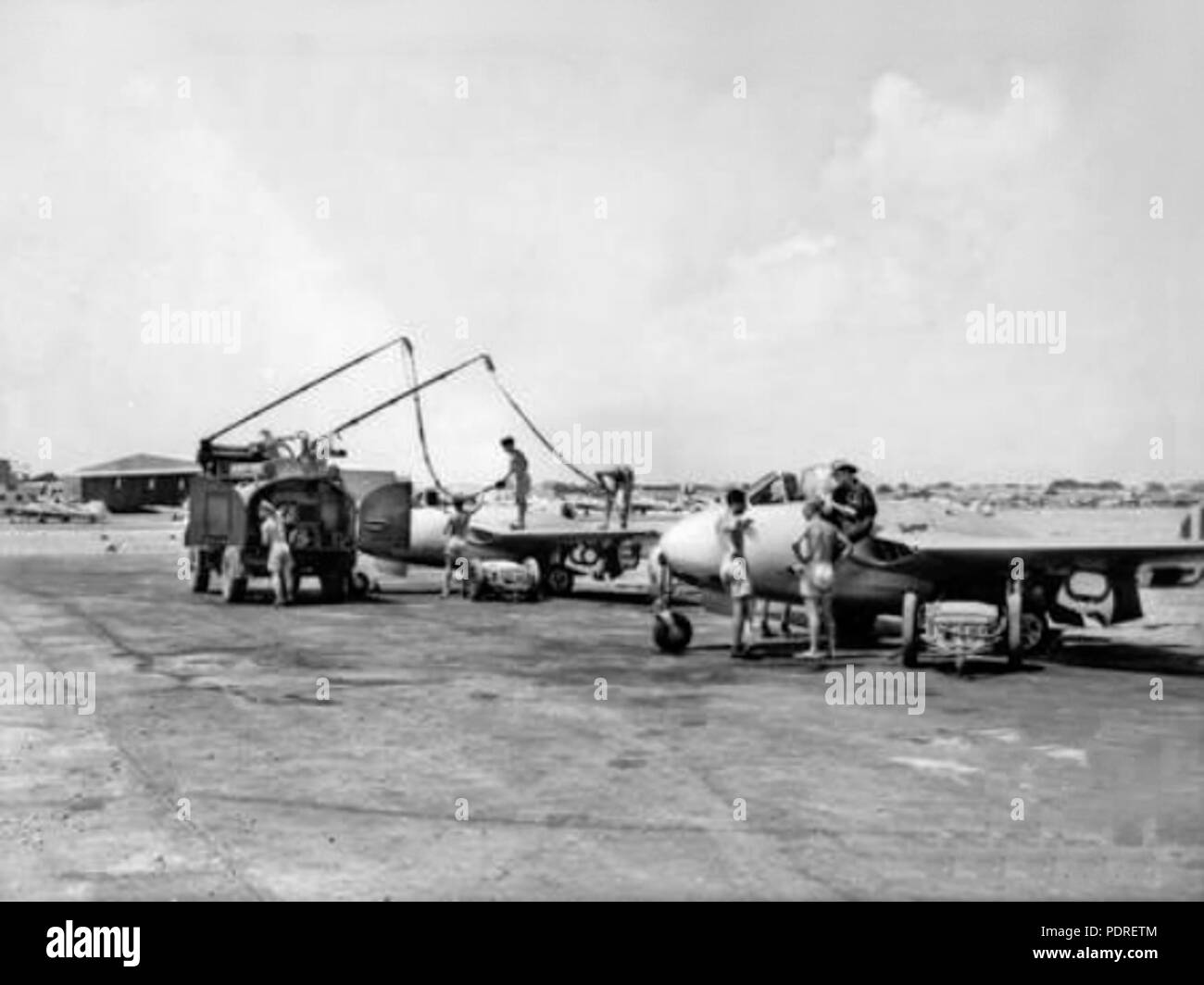 123 RAAF Vampire being refuelled at RAF Hal Far c1952 Stock Photo - Alamy