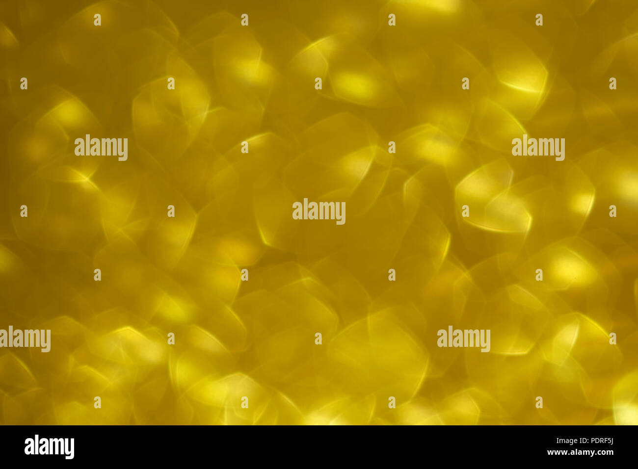 Shiny gold abstract background with a bokeh effect Stock Photo - Alamy