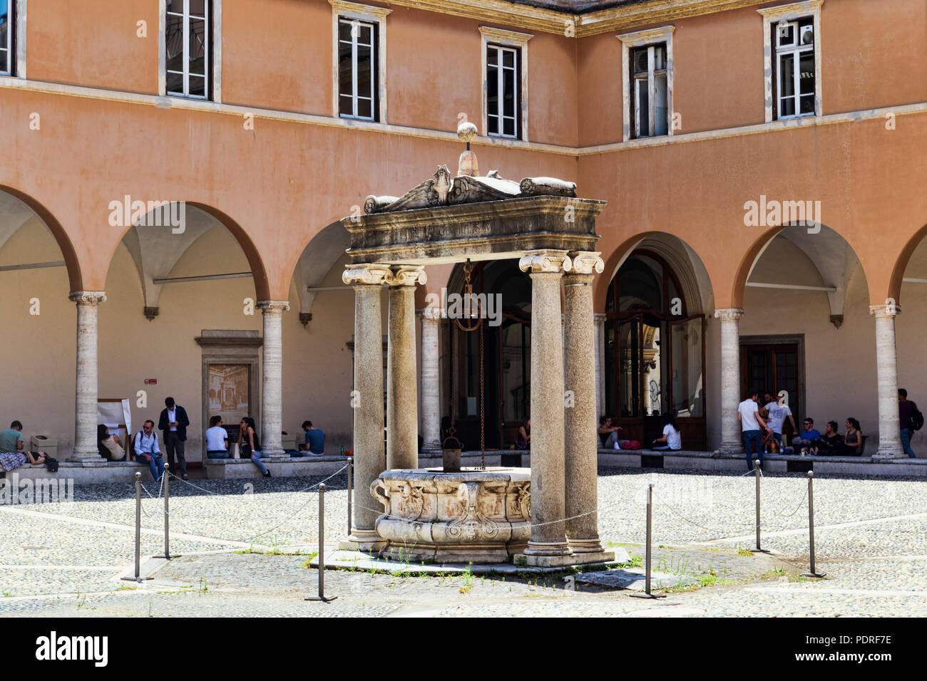 Rome,Italy - July 19, 2018:Ancient well in the courtyard of the ...