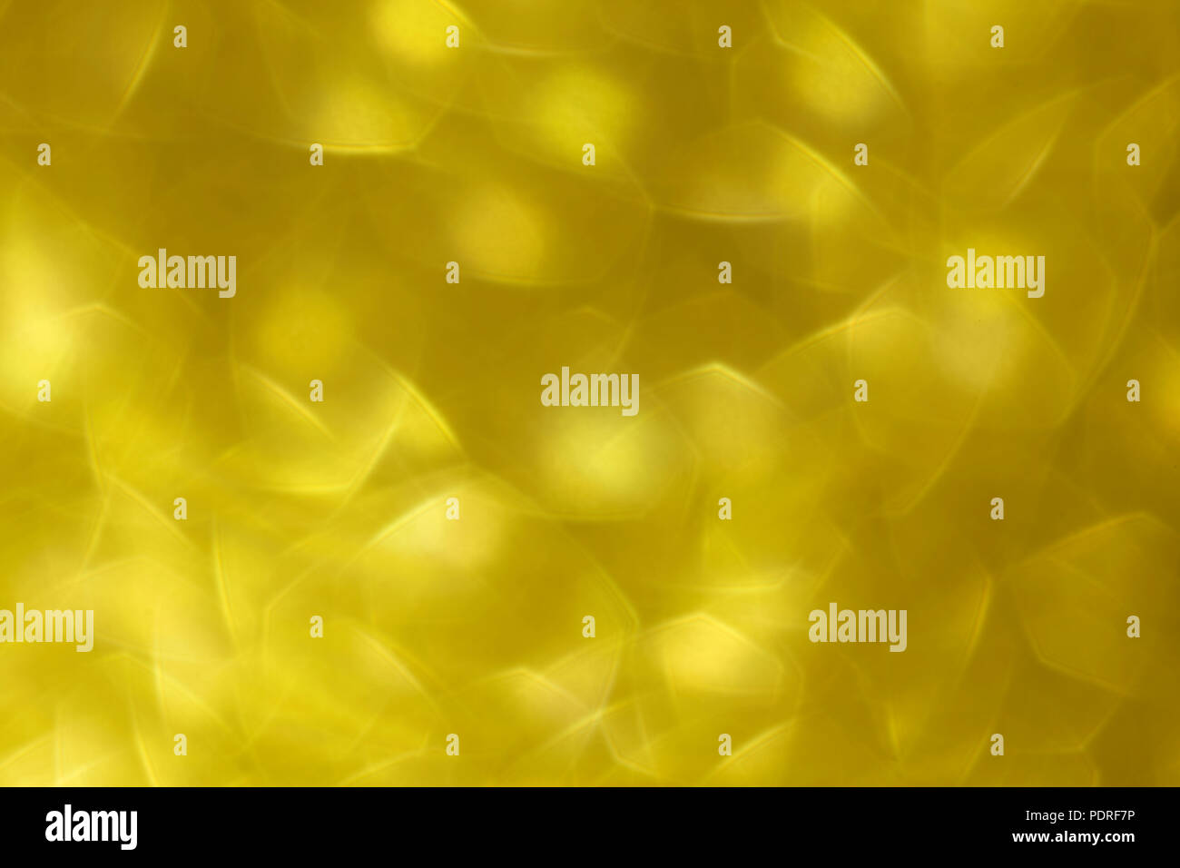 Shiny gold abstract background with a bokeh effect Stock Photo - Alamy